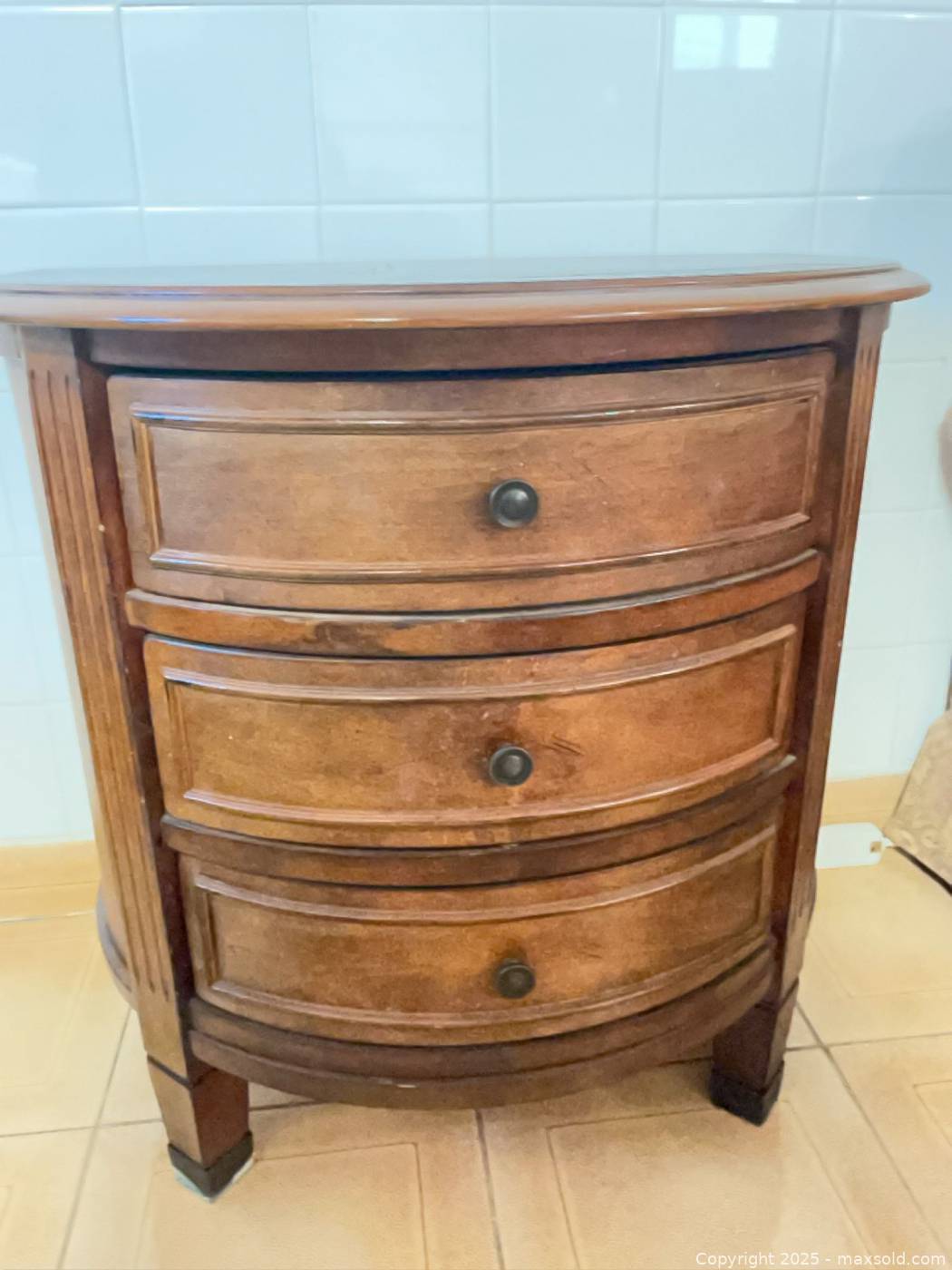 Demilune three-drawer wooden side table | Maxsold