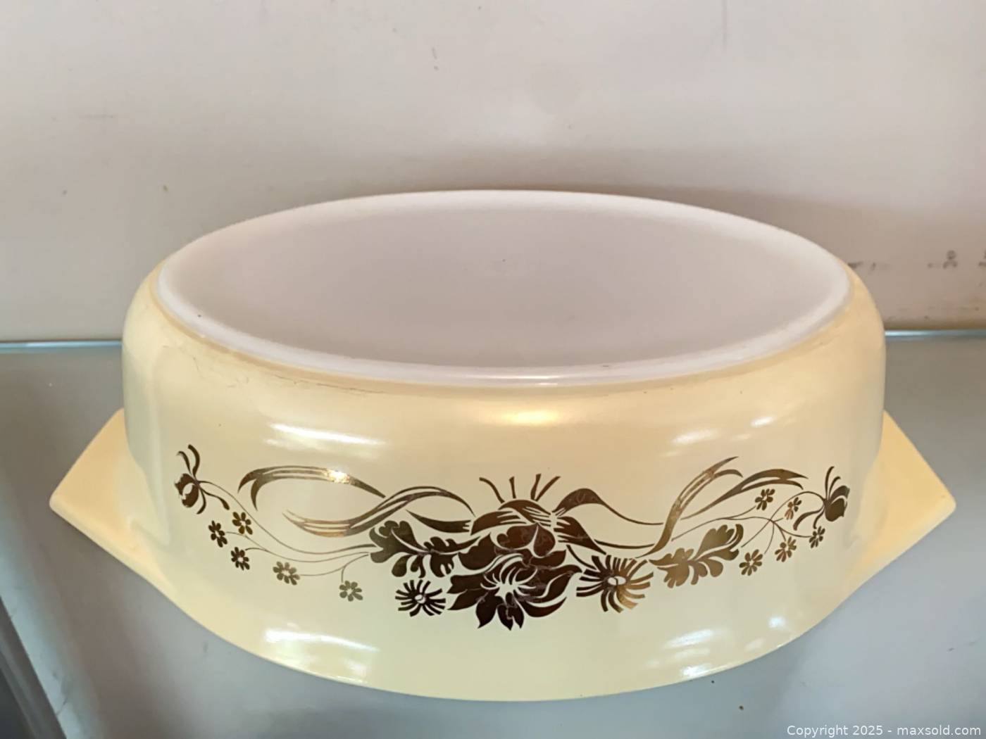 Vintage Pyrex Golden Bouquet casserole dish | Maxsold