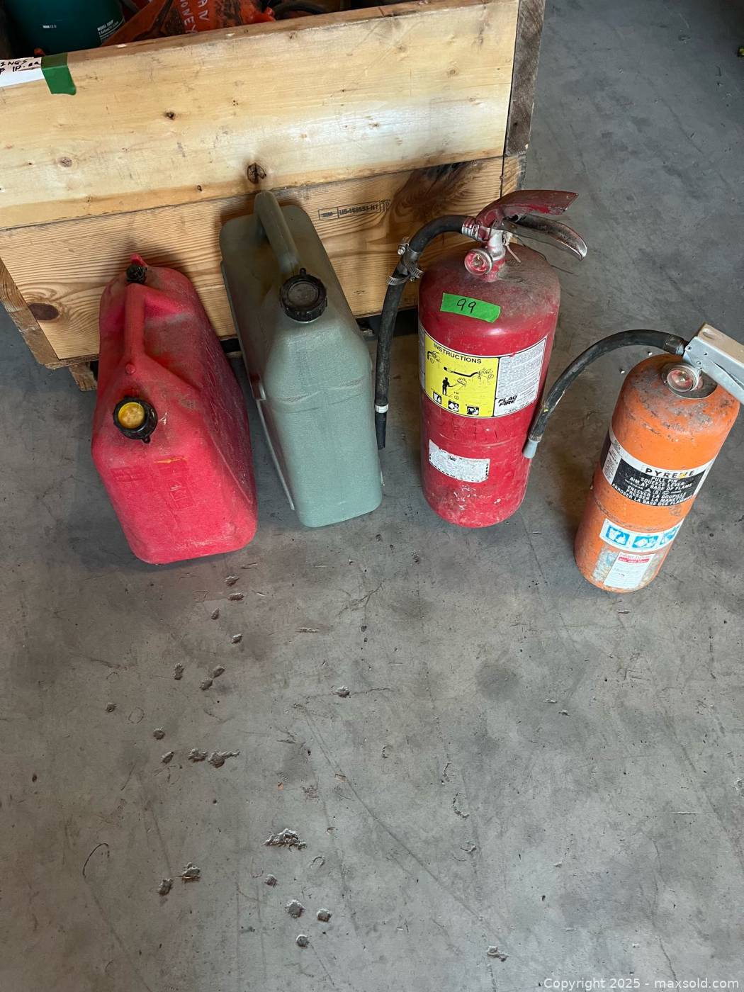 Two fire extinguishers and two fuel cans | Maxsold