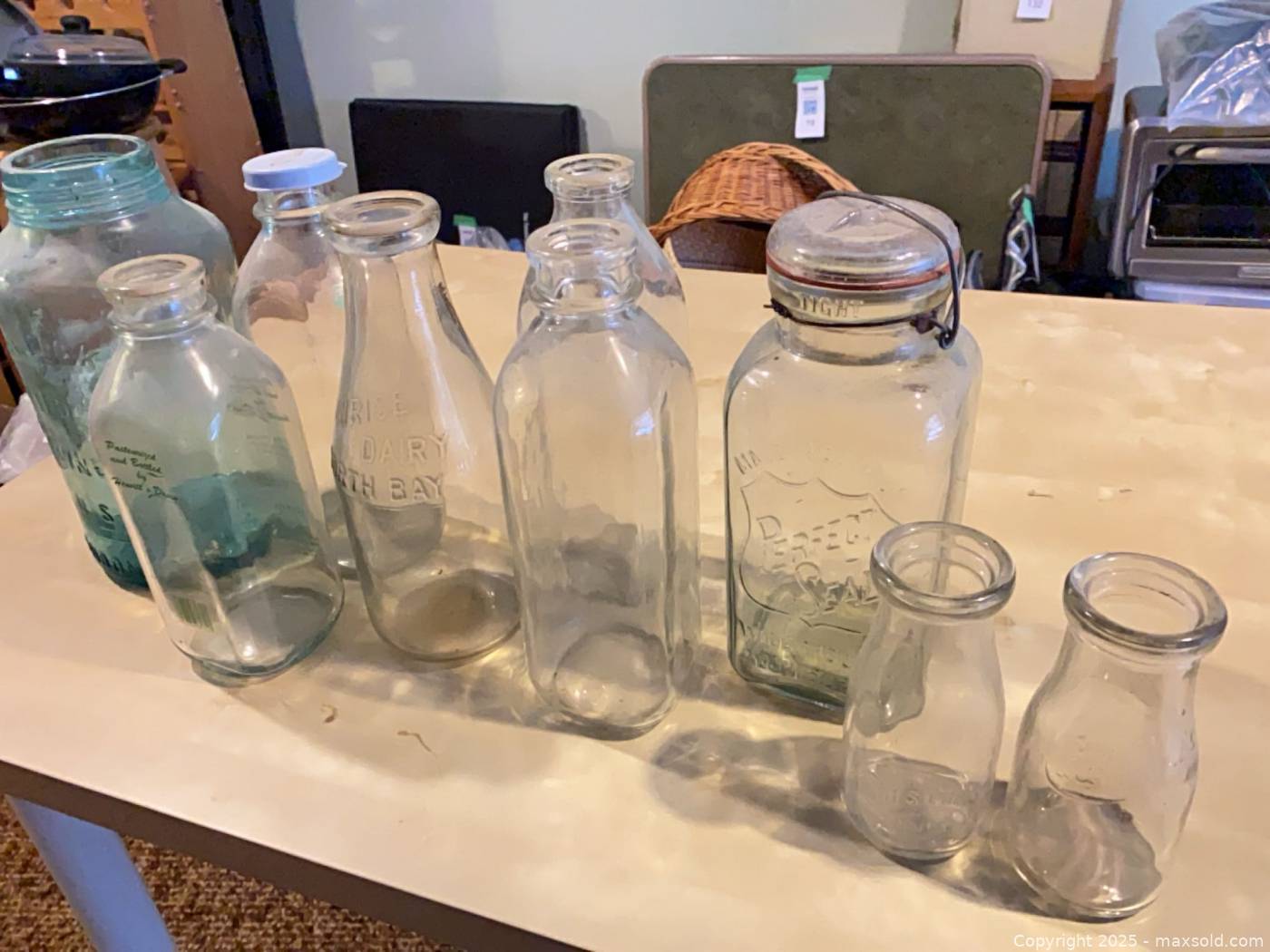 Vintage glass milk bottles and jar, 9-piece | Maxsold