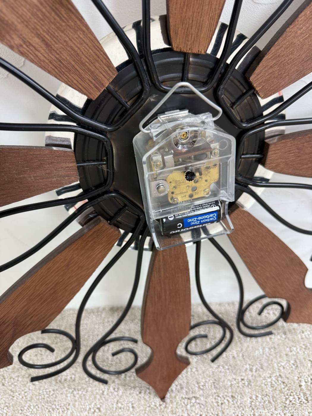 Vintage Phinney Walker sunburst wall clock | Maxsold