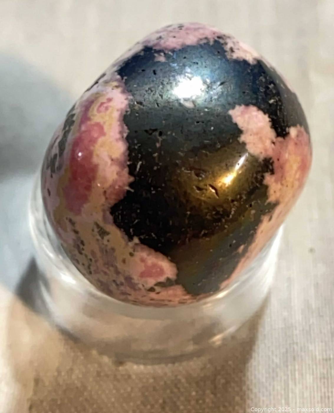 Rhodonite polished stone | Maxsold
