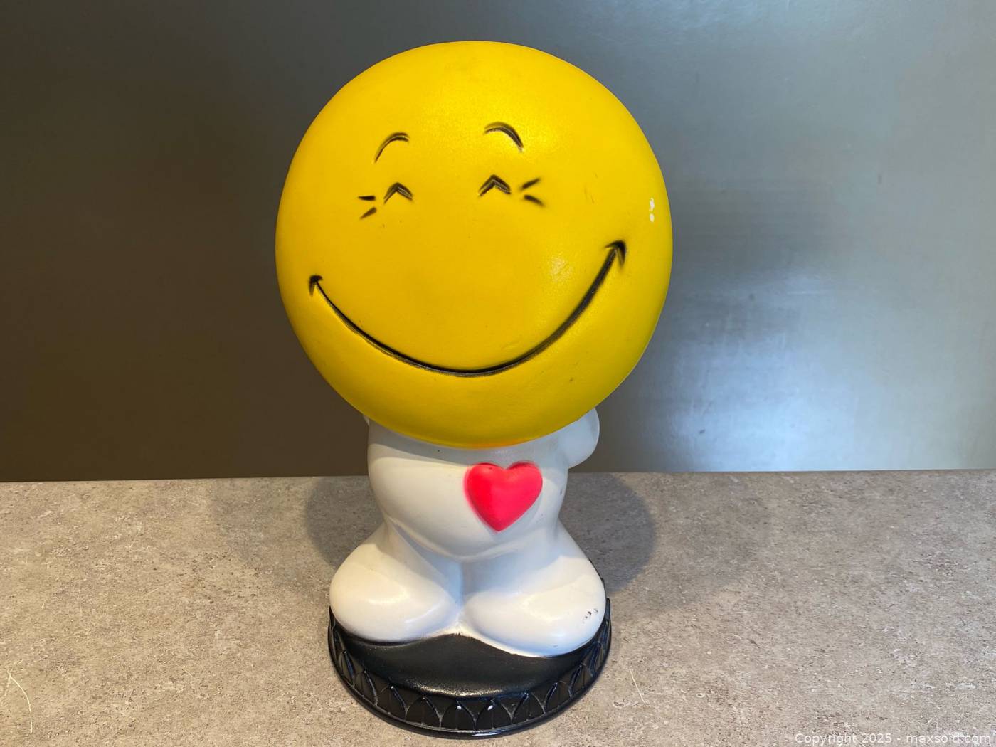 1971 Play Pal Plastics Smiley Face Coin Bank | Maxsold