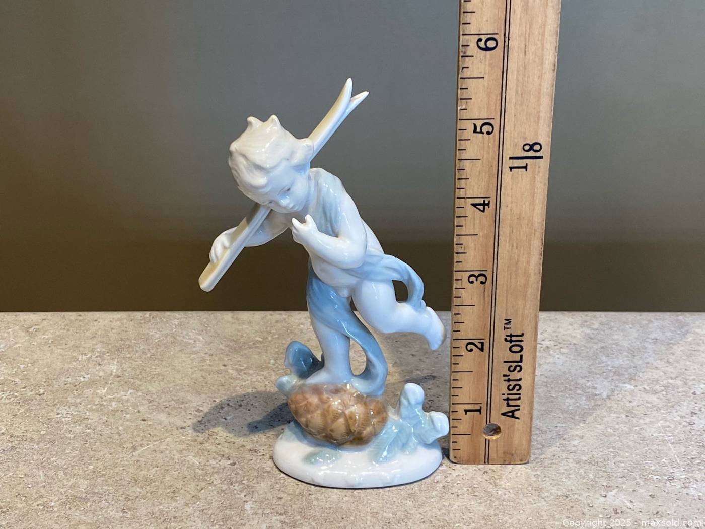 Metzler & Ortloff porcelain cherub figurine | Maxsold