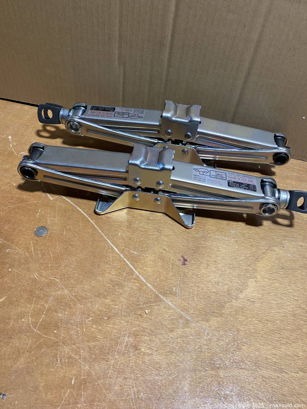 Pair stainless steel scissor car jacks | Maxsold