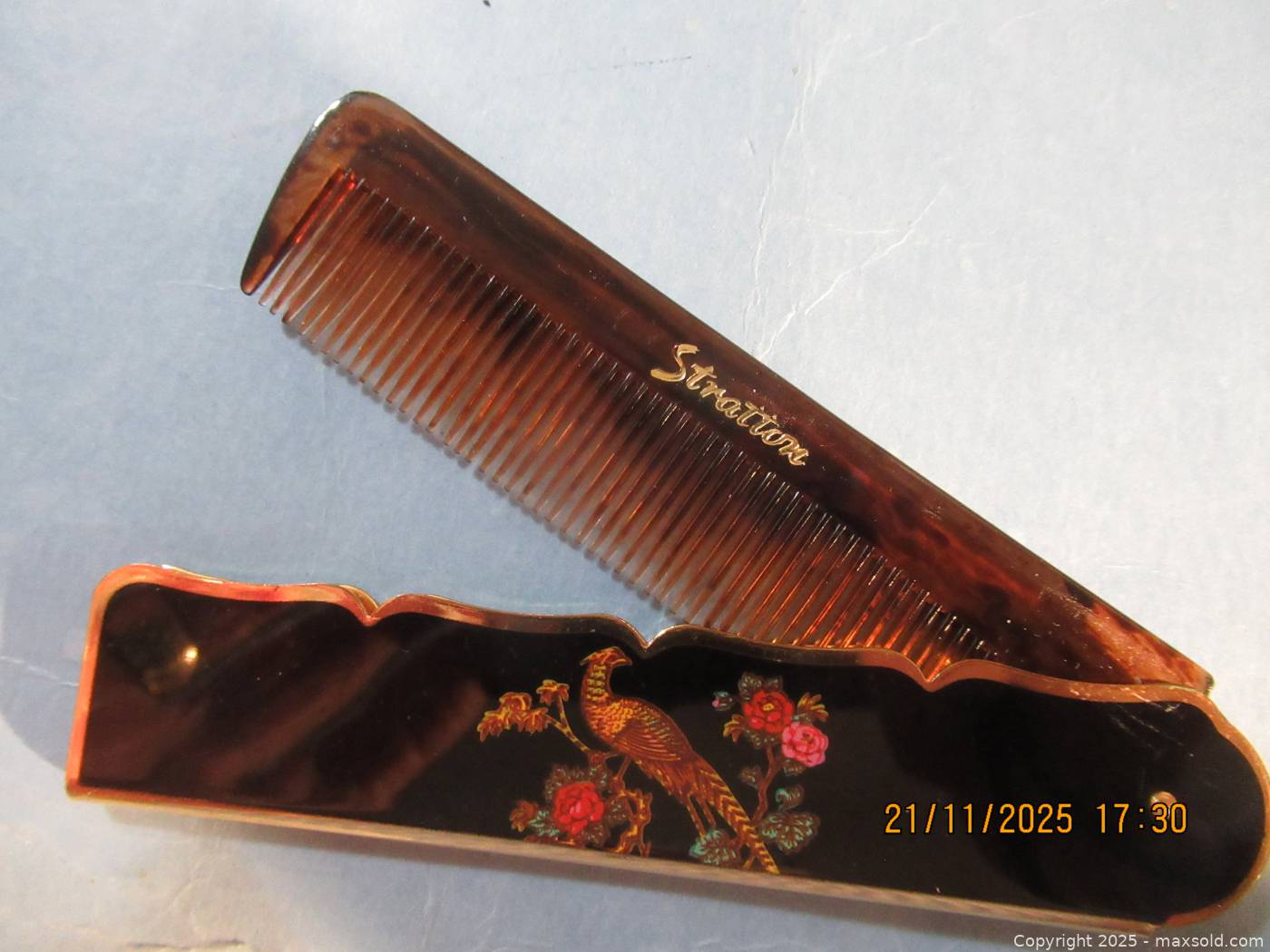 Liberty wallet and Stratton folding comb | Maxsold