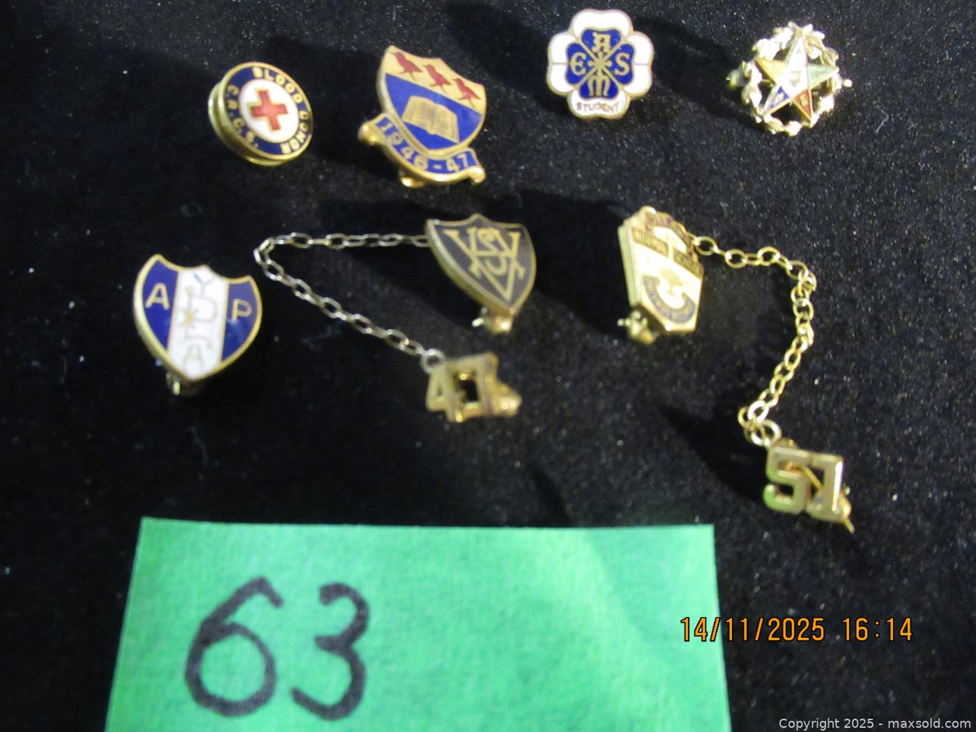 Selection of eight enamel lapel pins | Maxsold