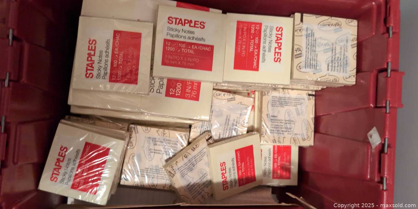 Staples sticky notes, file folders, hole punches | Maxsold