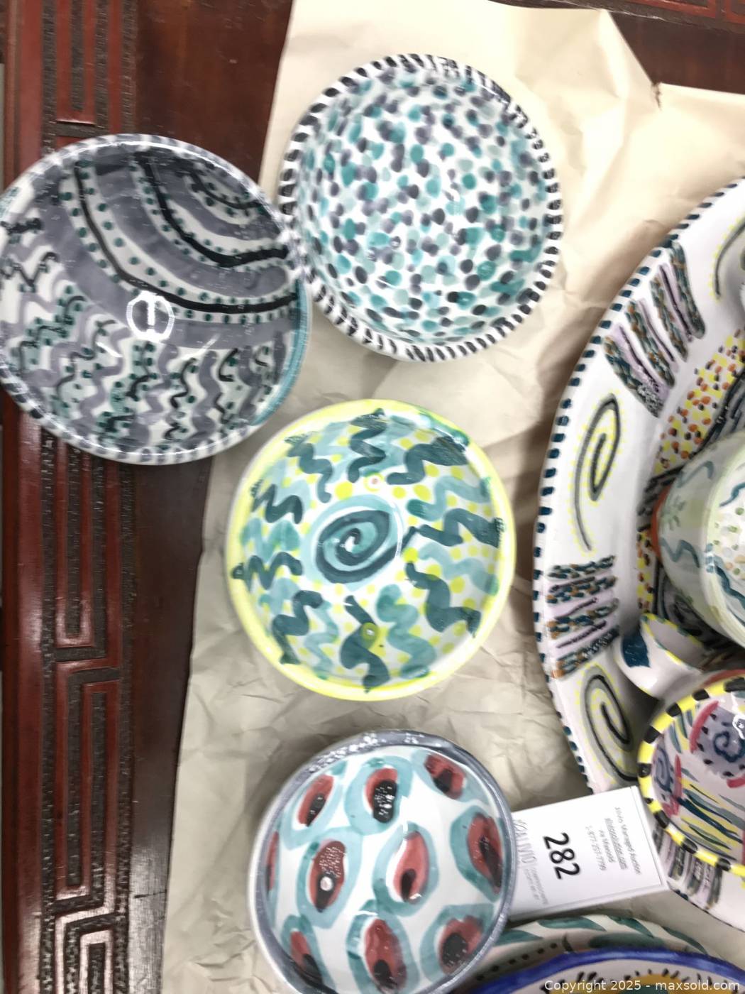 22-piece Janet Herbert hand-painted terracotta dinnerware | Maxsold