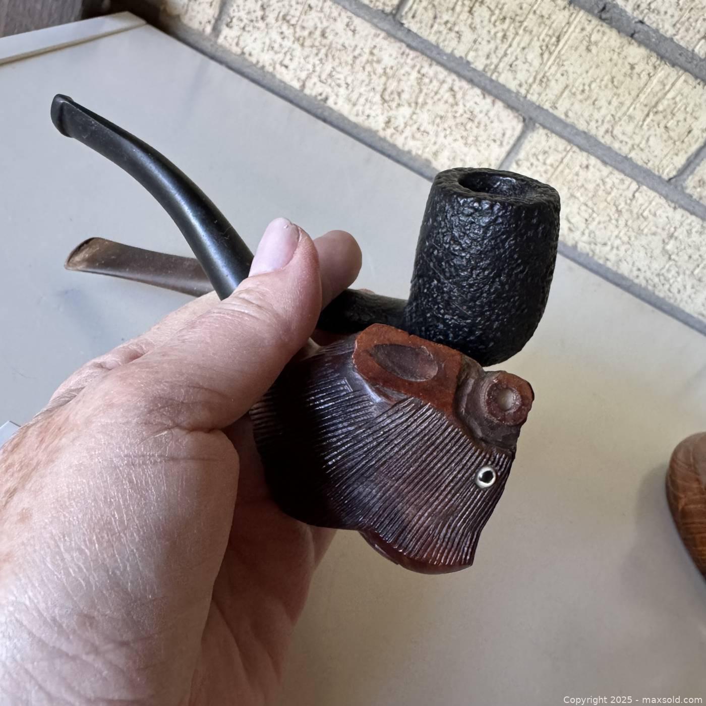 Carved briar bull-head tobacco pipe | Maxsold