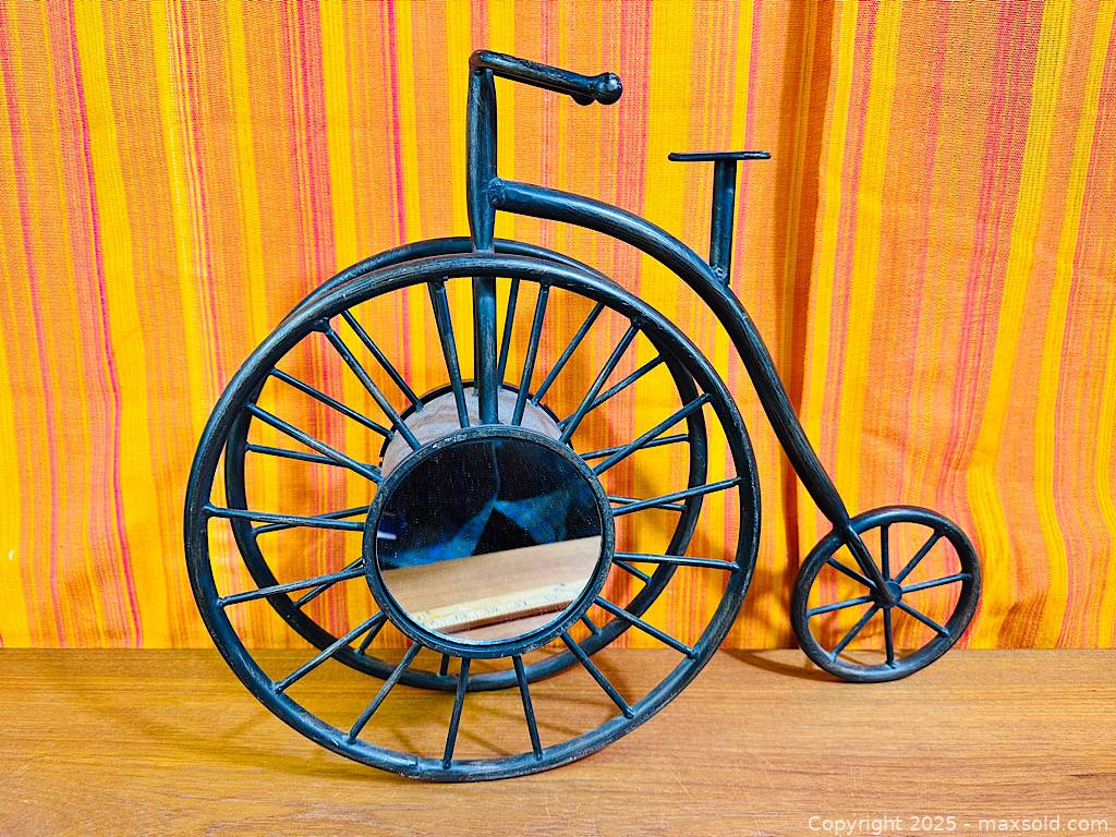 Wrought iron penny farthing clock and vintage 1950s clock | Maxsold