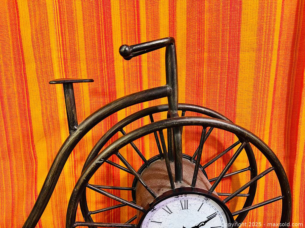 Wrought iron penny farthing clock and vintage 1950s clock | Maxsold