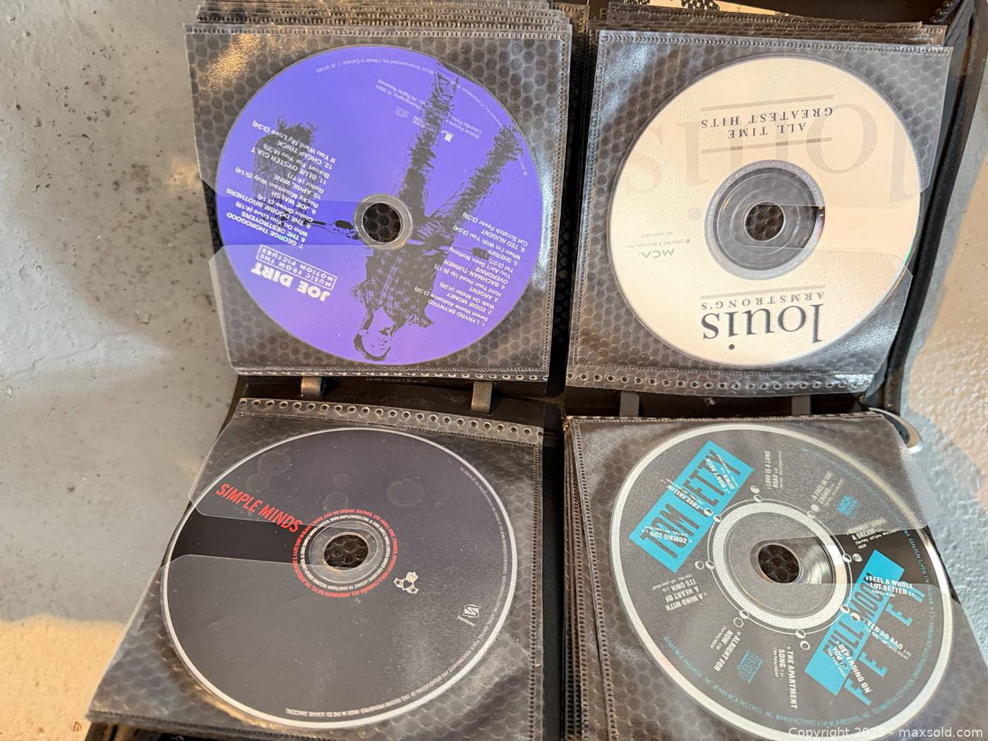 Music CDs and DVDs approximately 40–60 discs | Maxsold