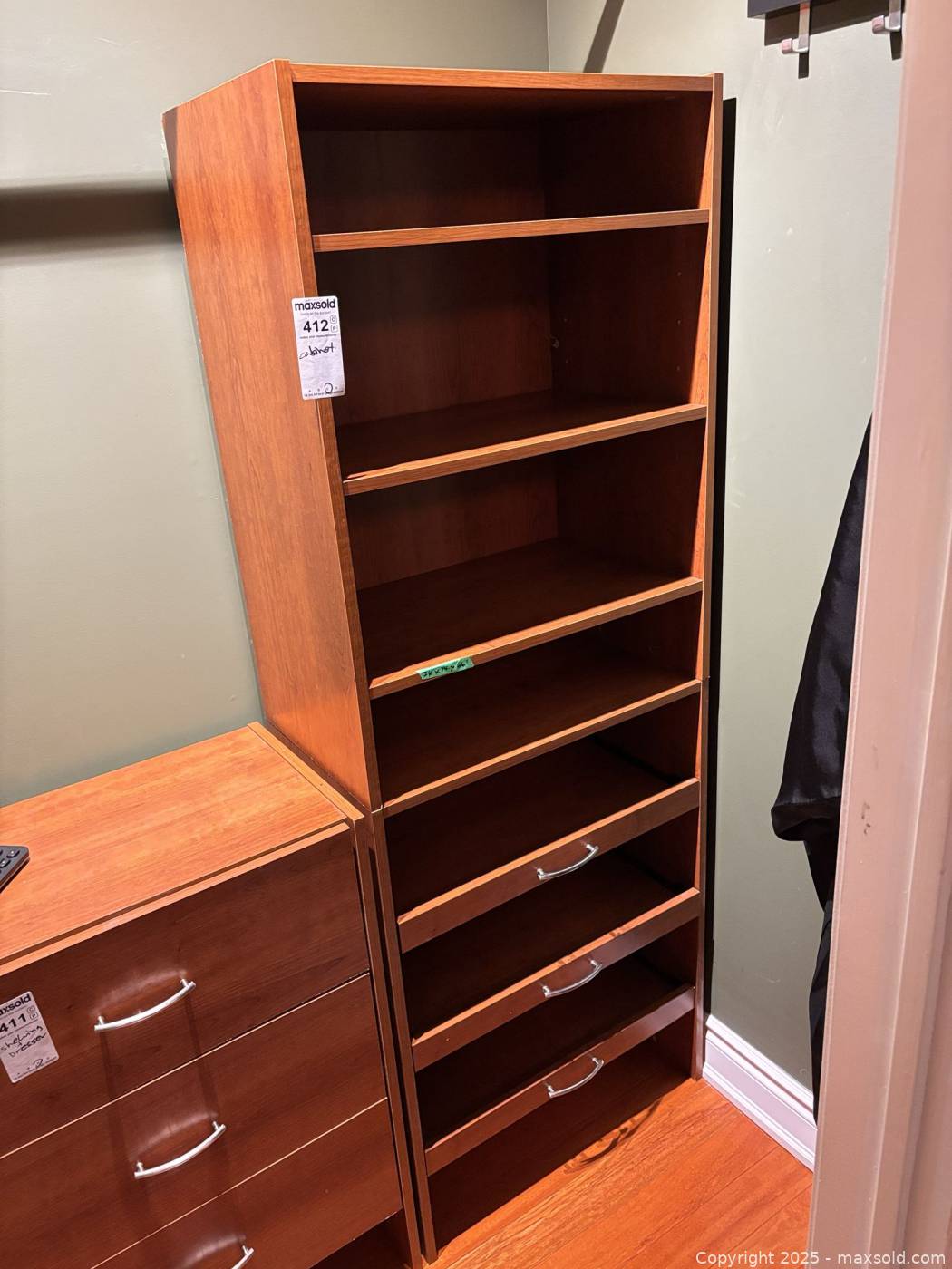 Laminate shelf unit with pull-out trays | Maxsold