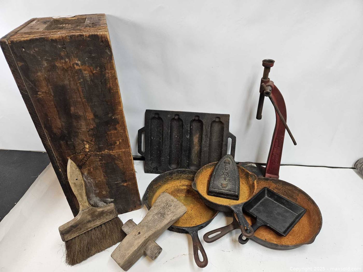 Cast iron bottle capper, pans & crate | Maxsold