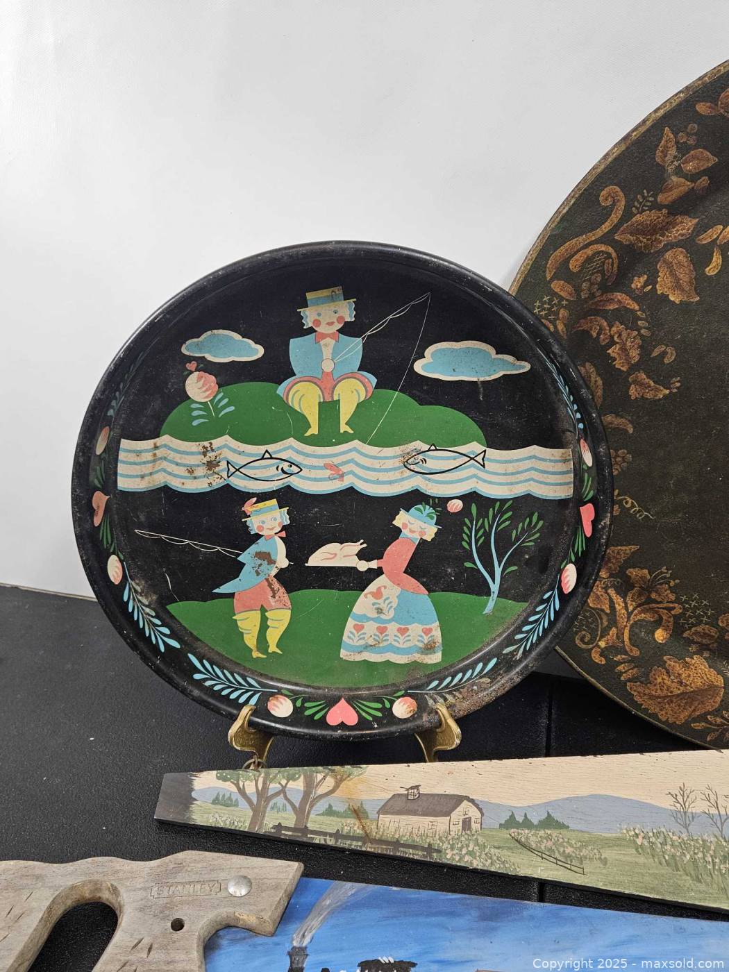 Folk art toleware trays, painted saws, turkey platter | Maxsold