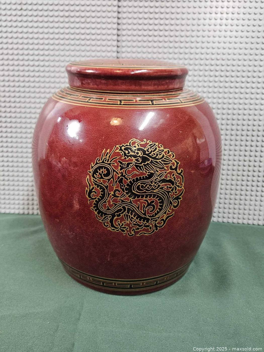 Large Chinese ginger jar on wood base | Maxsold