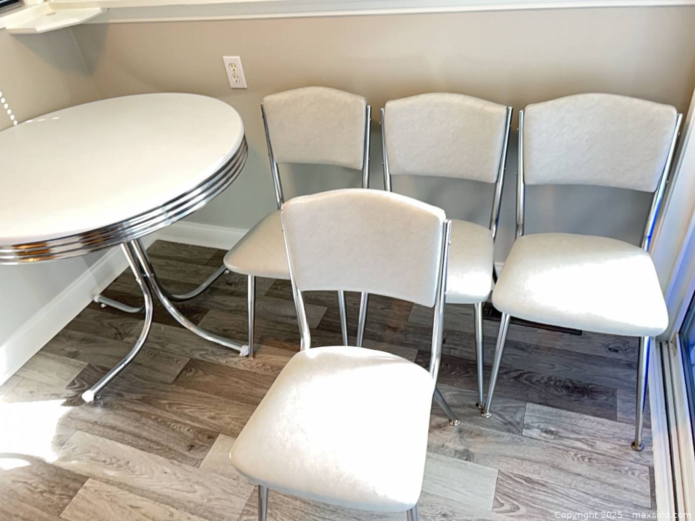 Retro chrome diner round table and 4 vinyl chairs | Maxsold