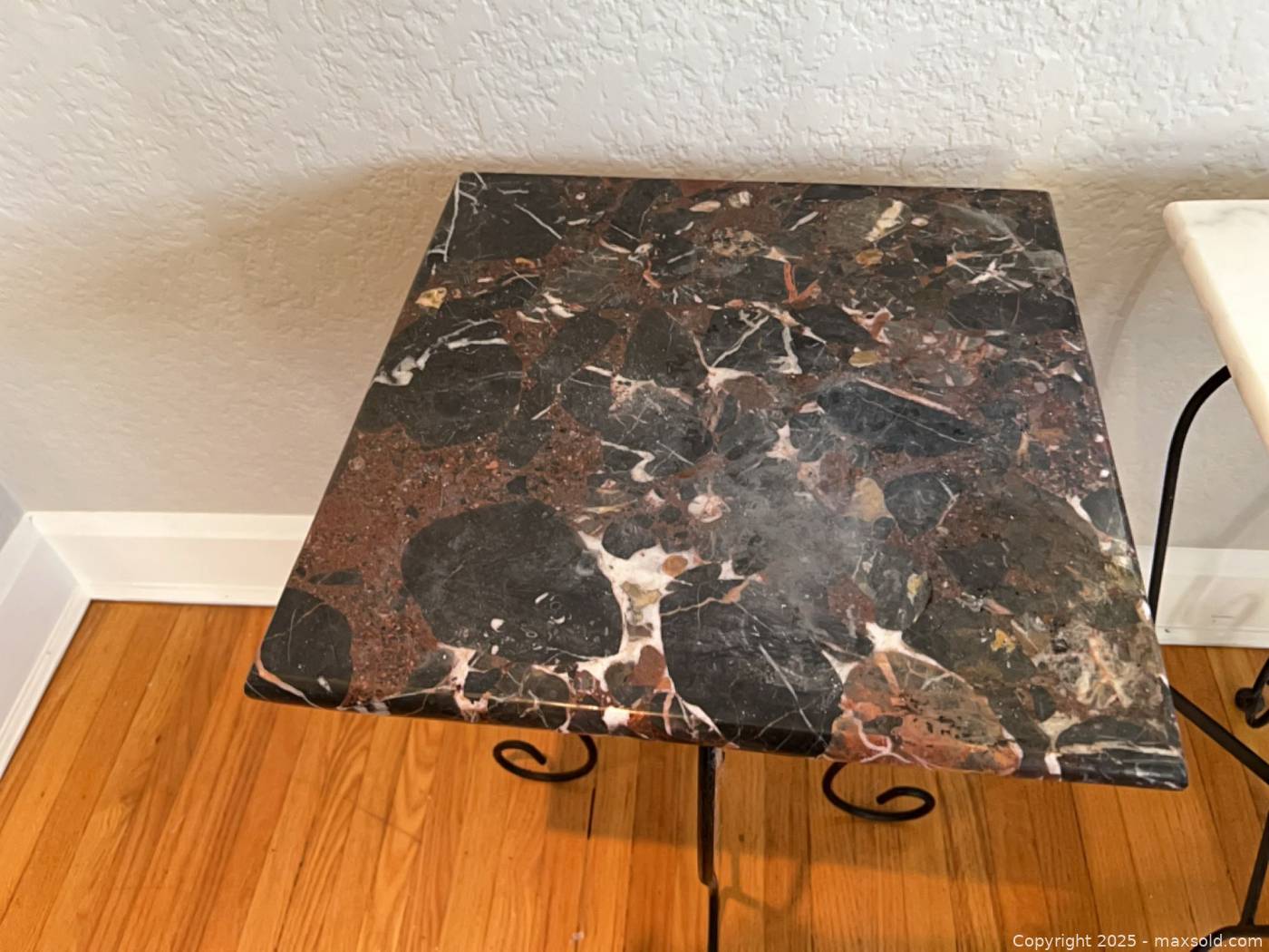 Set of three marble top wrought iron side tables | Maxsold