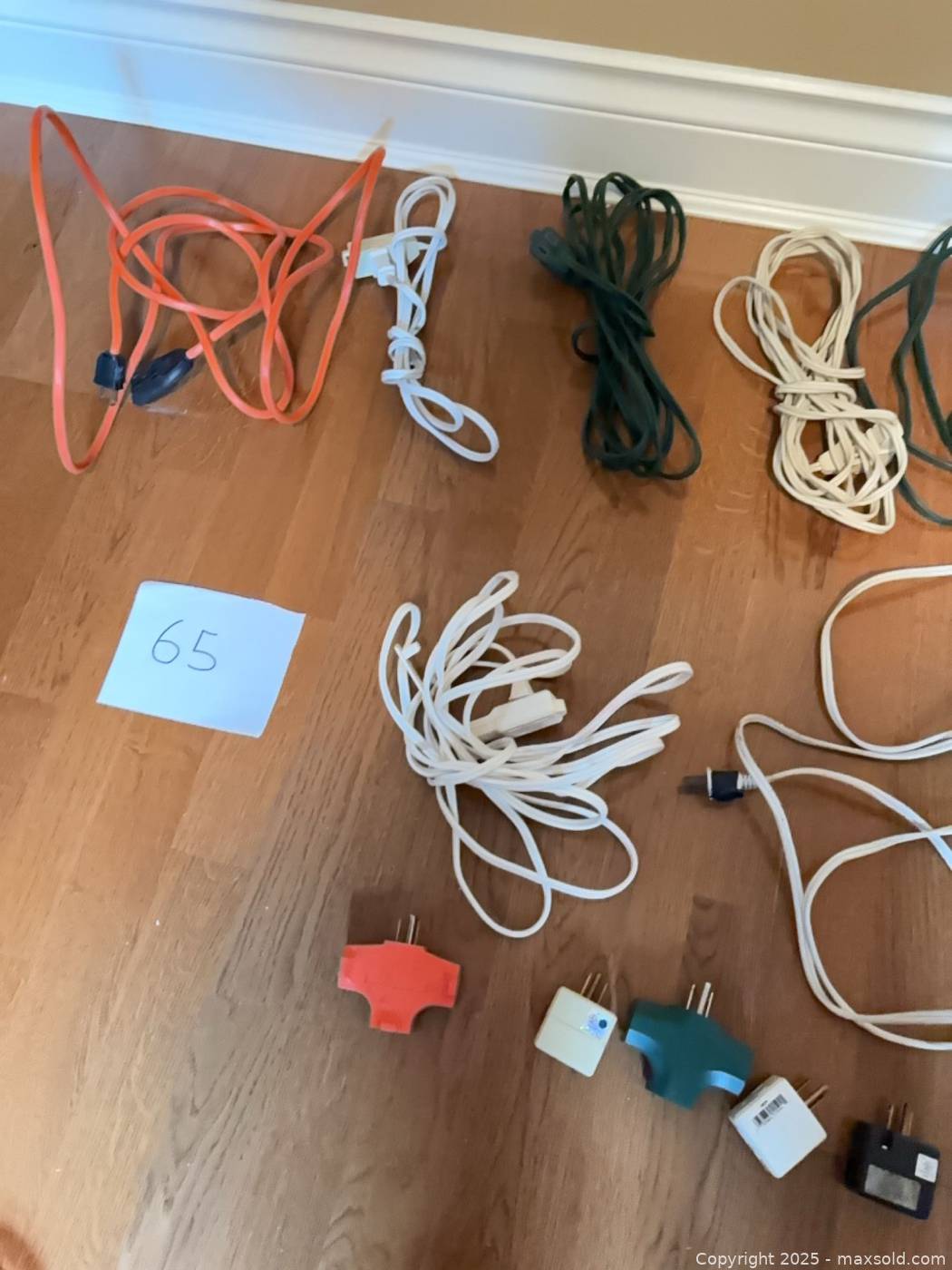 23 two-prong extension cords with 6 outlet adapters | Maxsold