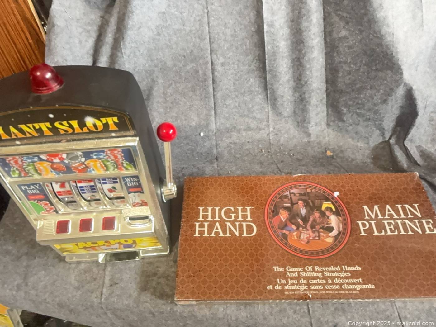 Giant Slot tabletop toy machine and High Hand board game | Maxsold