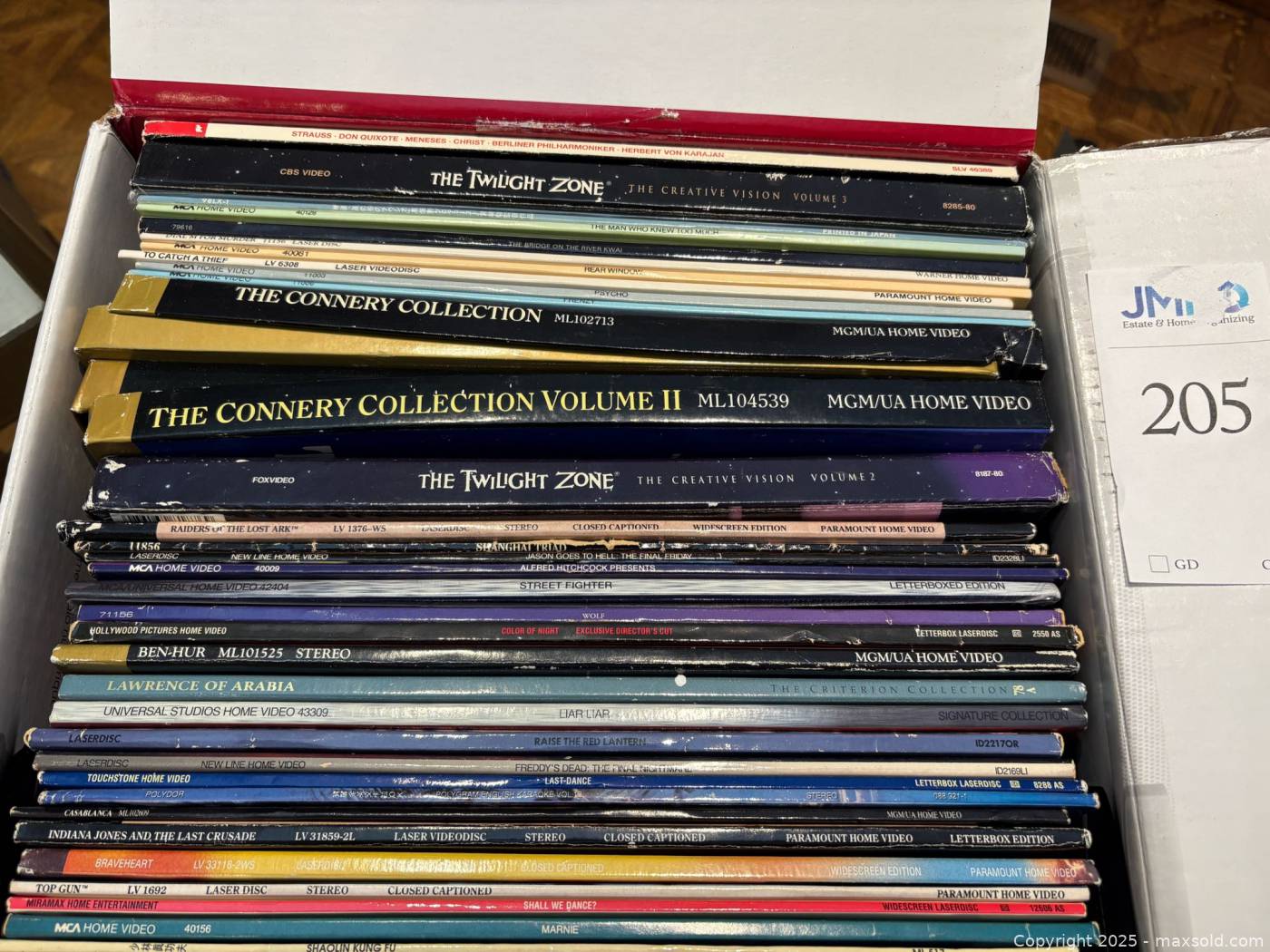 Laserdiscs and vinyl record albums | Maxsold