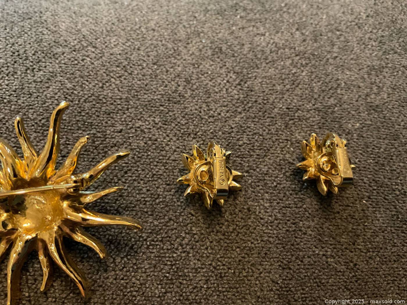 D’Orlan Buried Treasure brooch and earrings set | Maxsold