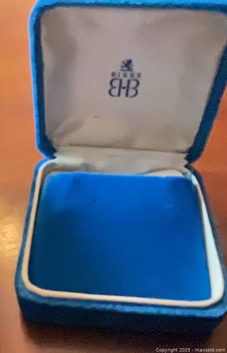 Two Birks and one Christian Dior jewellery presentation boxes | Maxsold