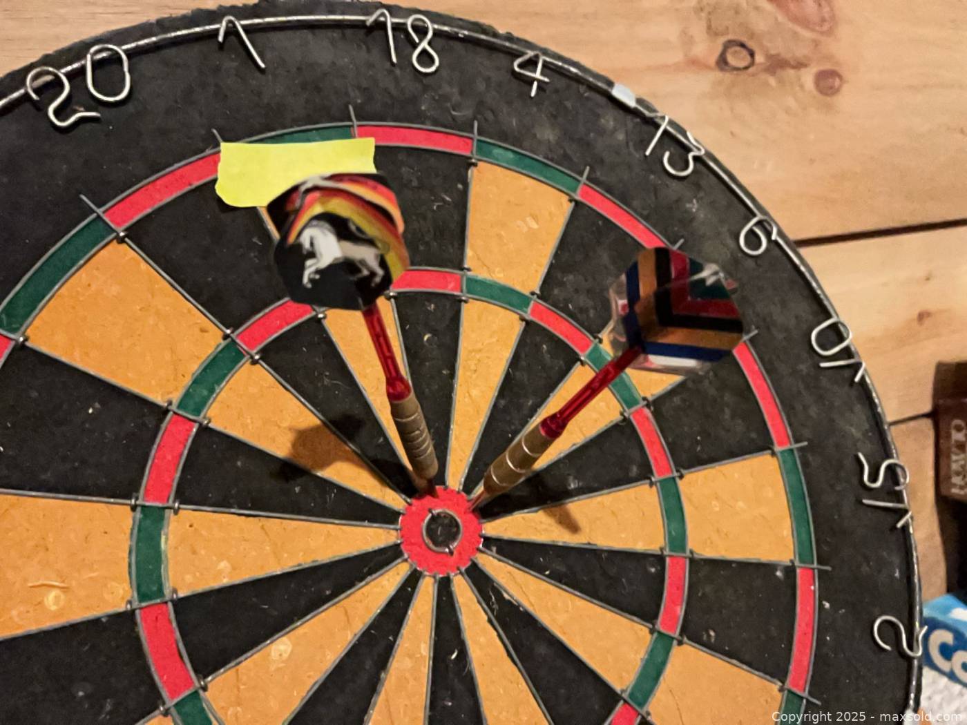 Wood dartboard, darts, poker set | Maxsold