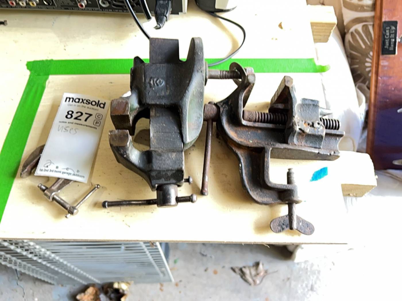 Two clamp-on bench vises with C-clamp | Maxsold
