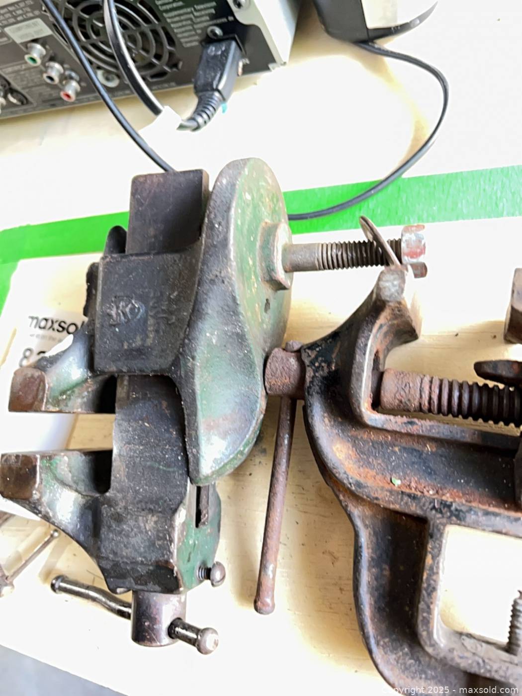 Two clamp-on bench vises with C-clamp | Maxsold