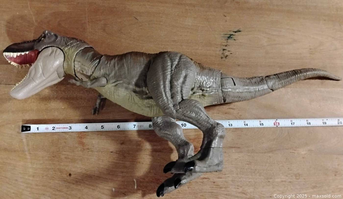 Mattel Jurassic World T. rex action figure | Maxsold