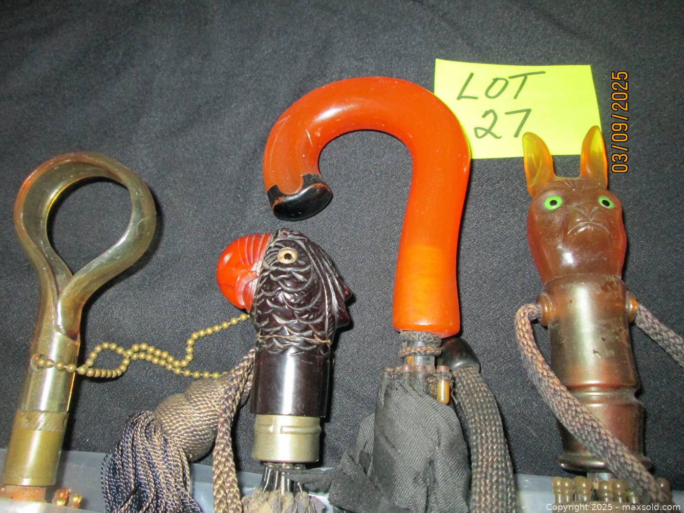 Antique umbrella handles | Maxsold
