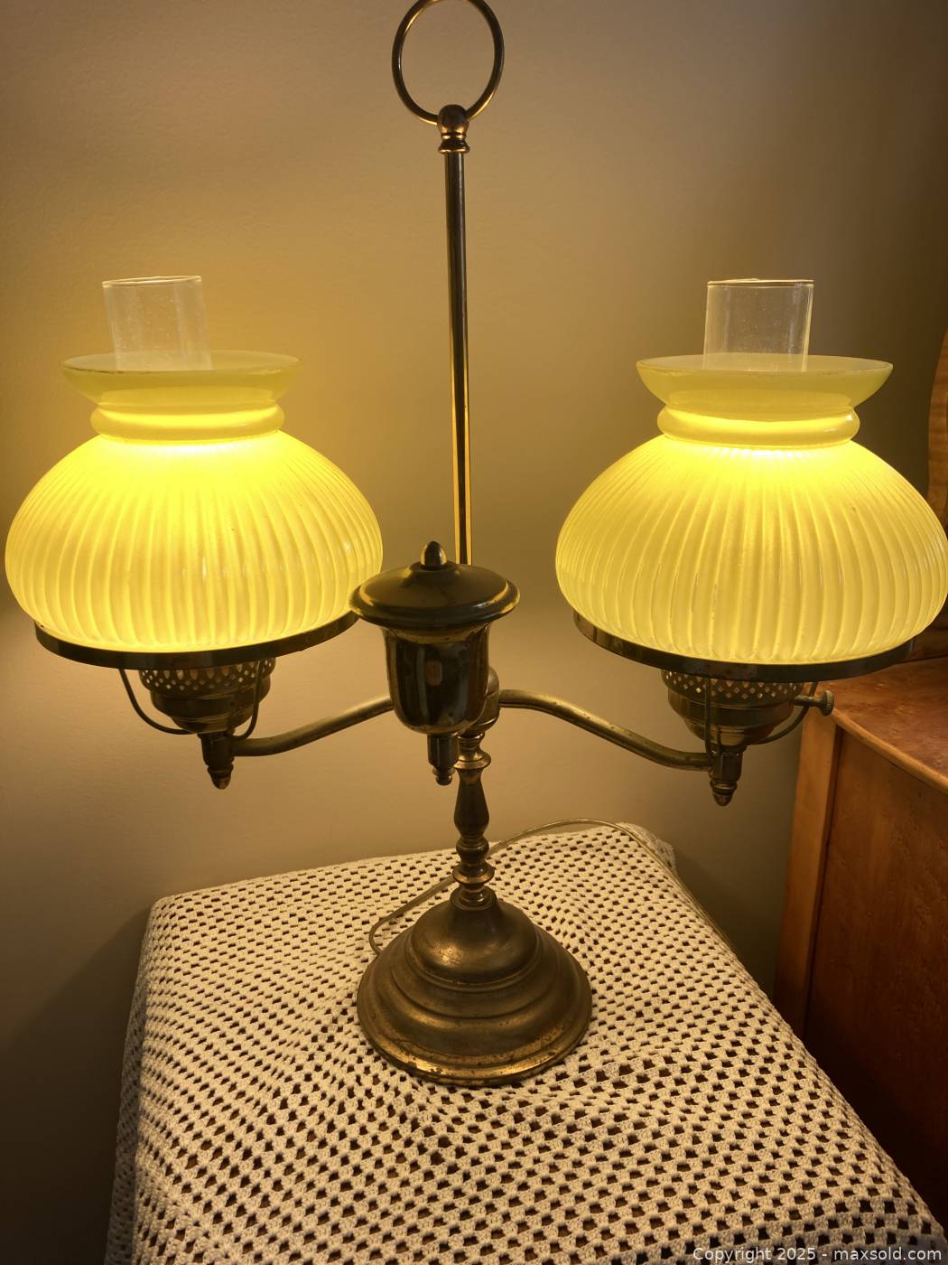 Brass double student lamp with yellow ribbed glass shades | Maxsold