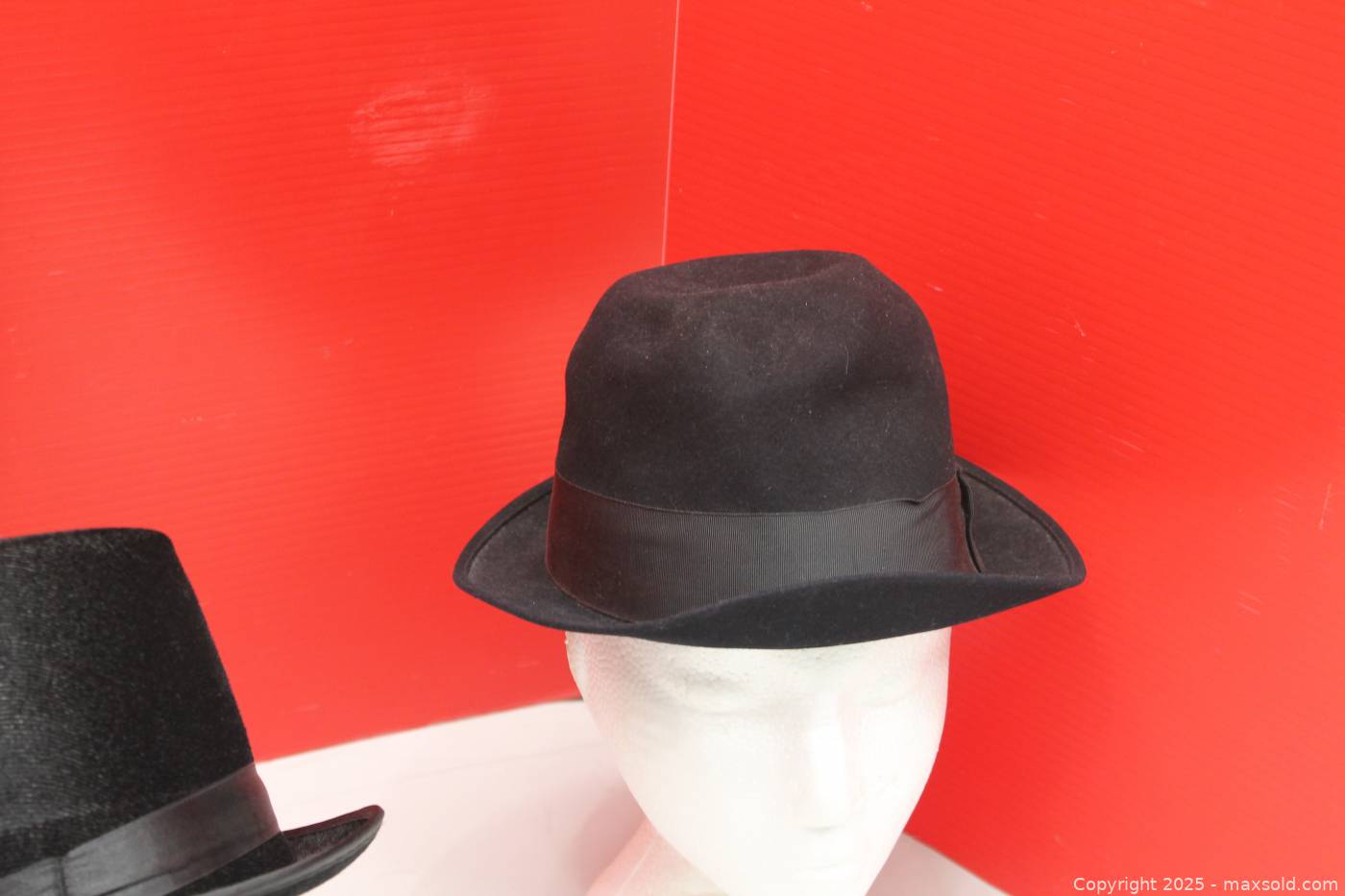 Two black felt hats | Maxsold