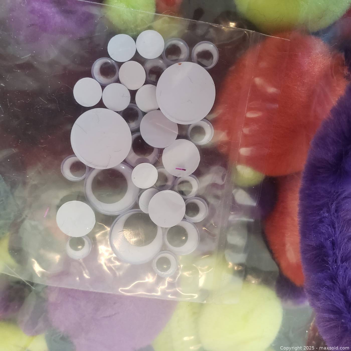 Pipe cleaners, pom poms and googly eyes | Maxsold