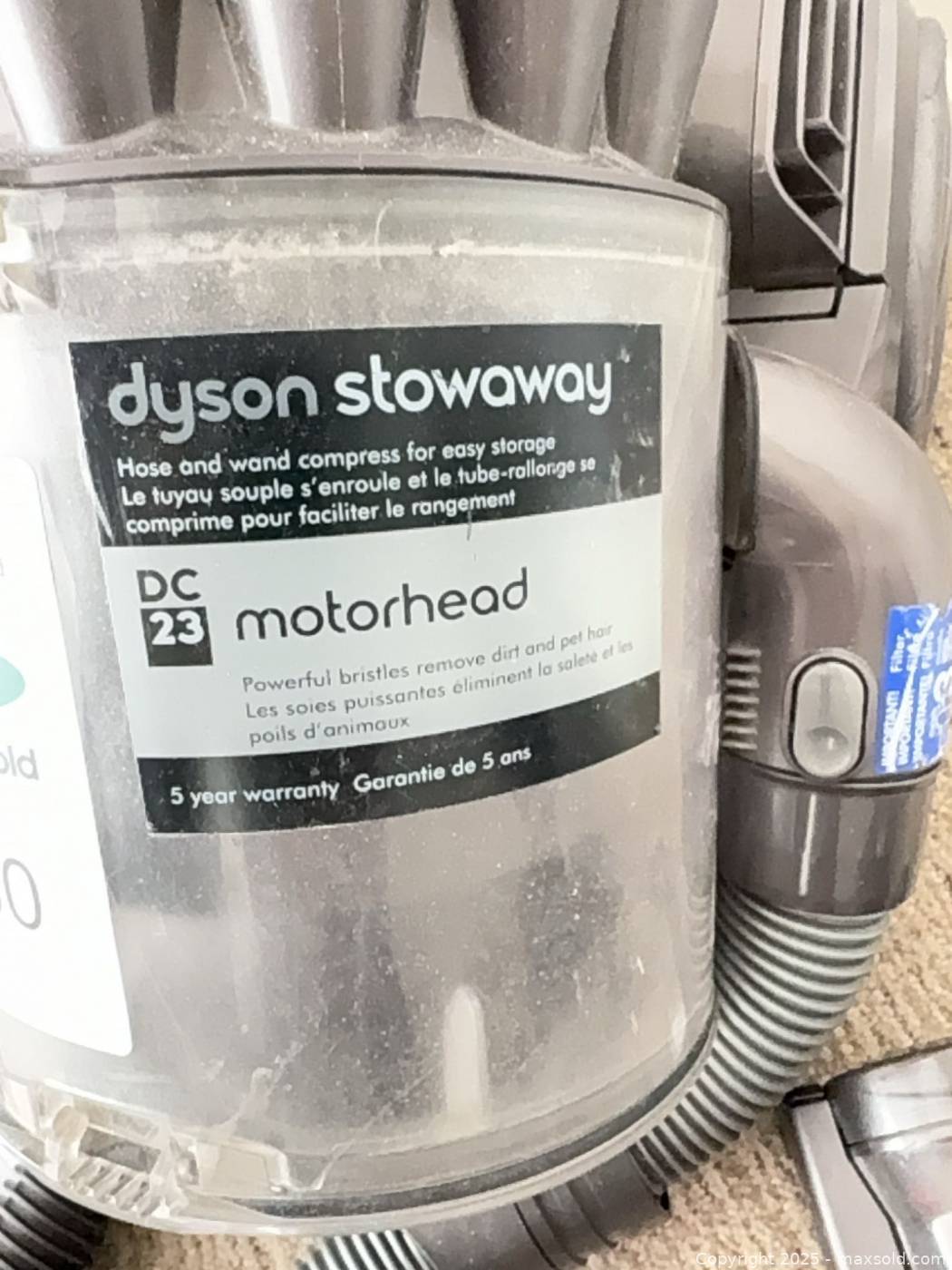 Dyson DC23 Motorhead Stowaway canister vacuum | Maxsold
