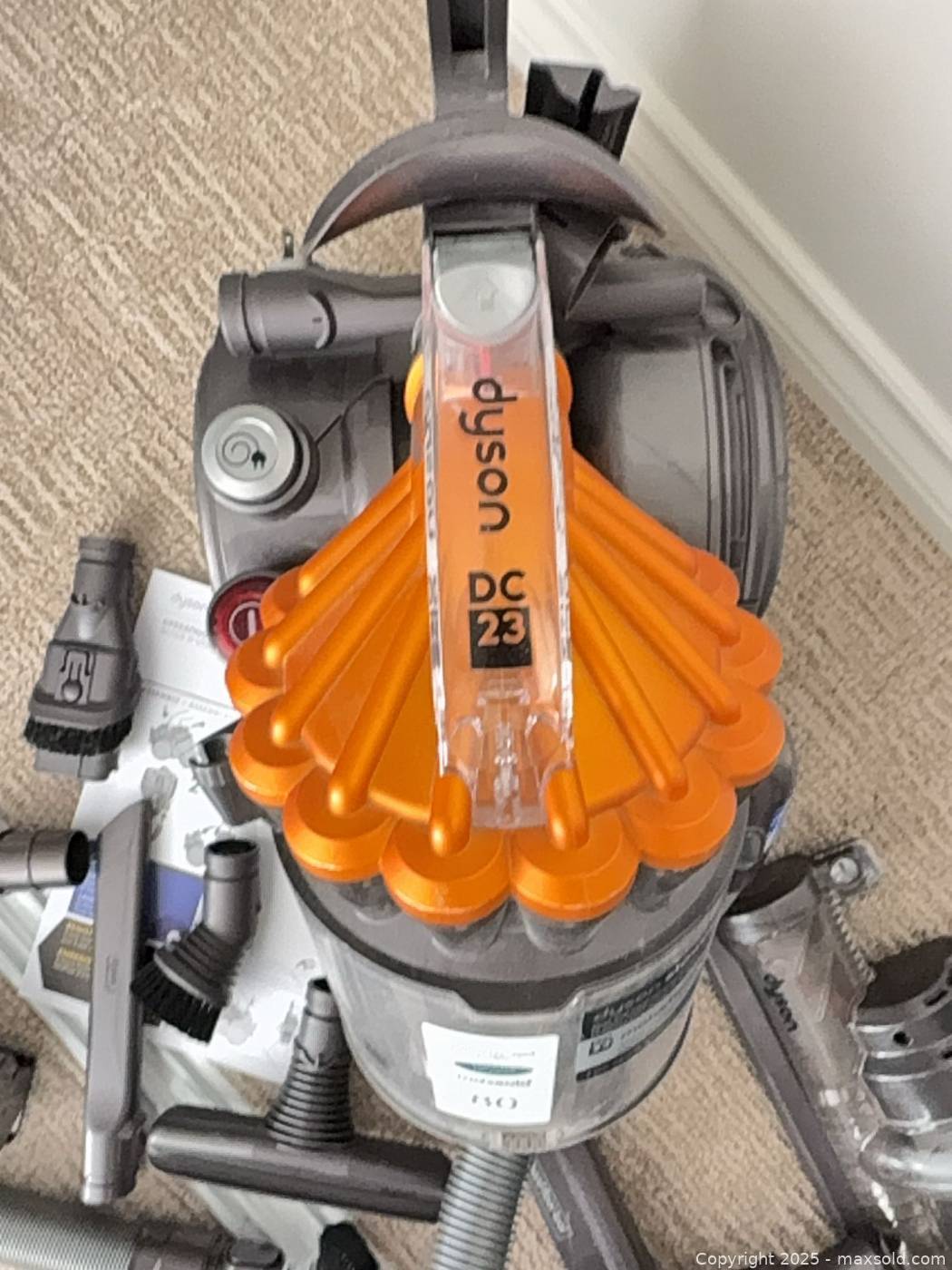 Dyson DC23 Motorhead Stowaway canister vacuum | Maxsold