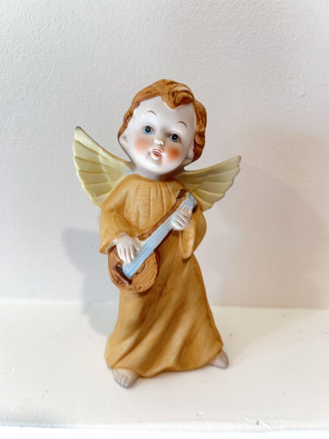 Two ceramic angel musician figurines 6" | Maxsold