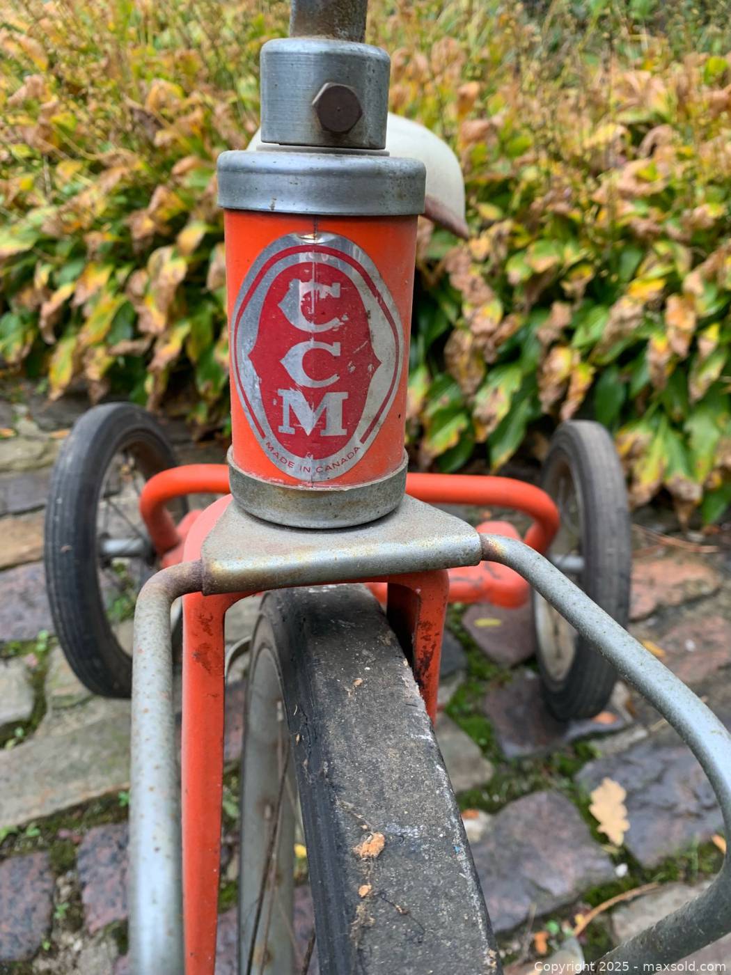 Vintage 1970s CCM red tricycle with fender | Maxsold