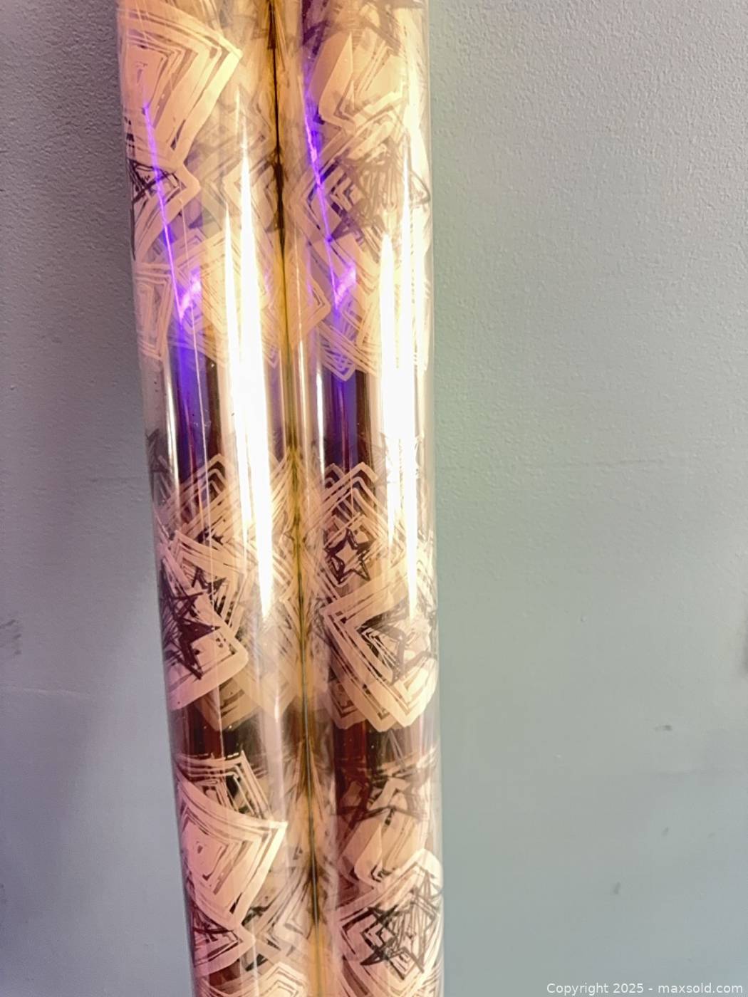 Two 40" x 100' star print cellophane rolls | Maxsold
