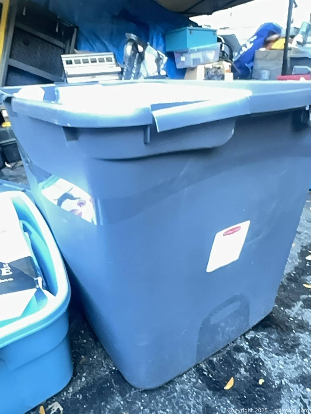 Three bins filled with printer paper | Maxsold