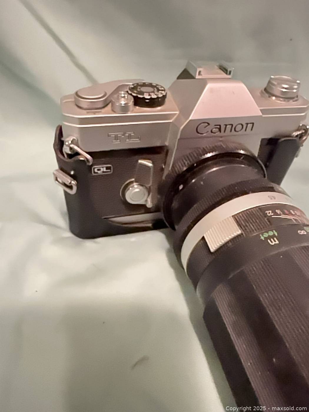 Canon TL 35mm film camera with lens | Maxsold