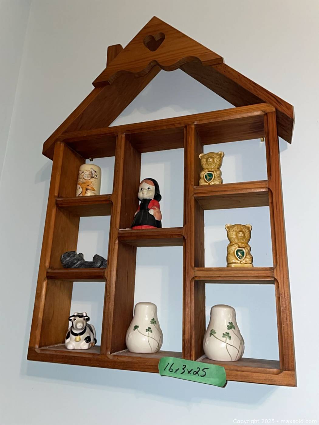 Pair solid wood wall display shelves with figurines | Maxsold
