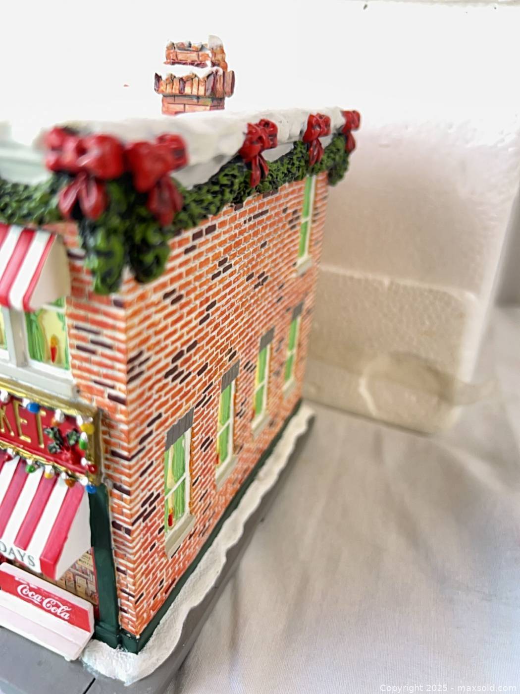 Coca-Cola Hawthorne Holly Leaves Market Lighted Building | Maxsold