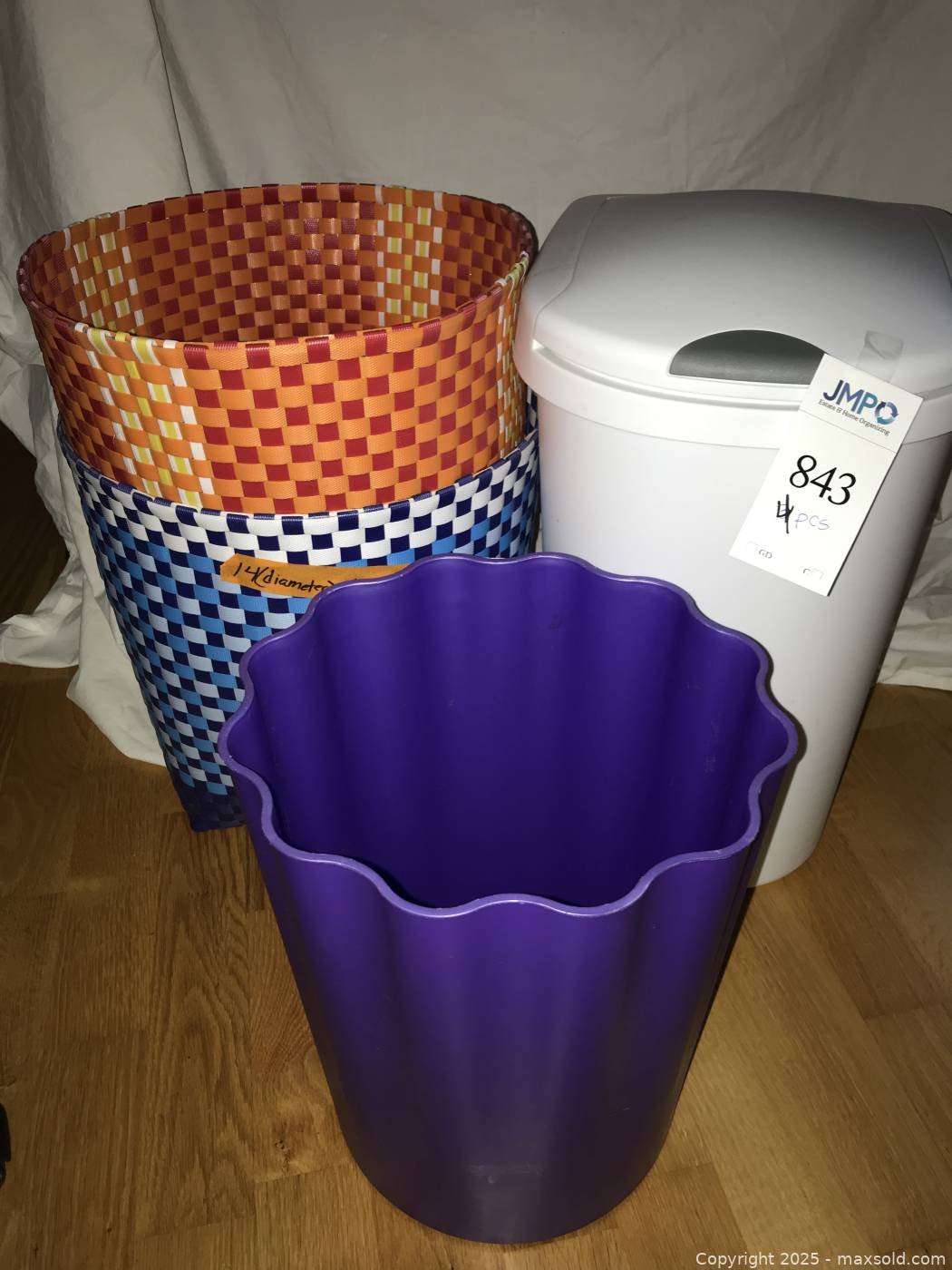 Four plastic wastebaskets and trash can | Maxsold