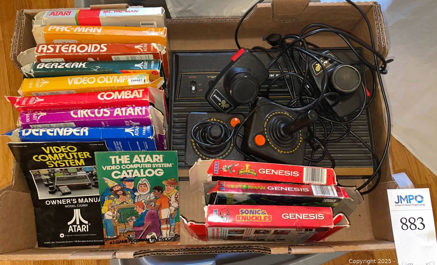 Atari 2600 console, controllers, 7 games | Maxsold