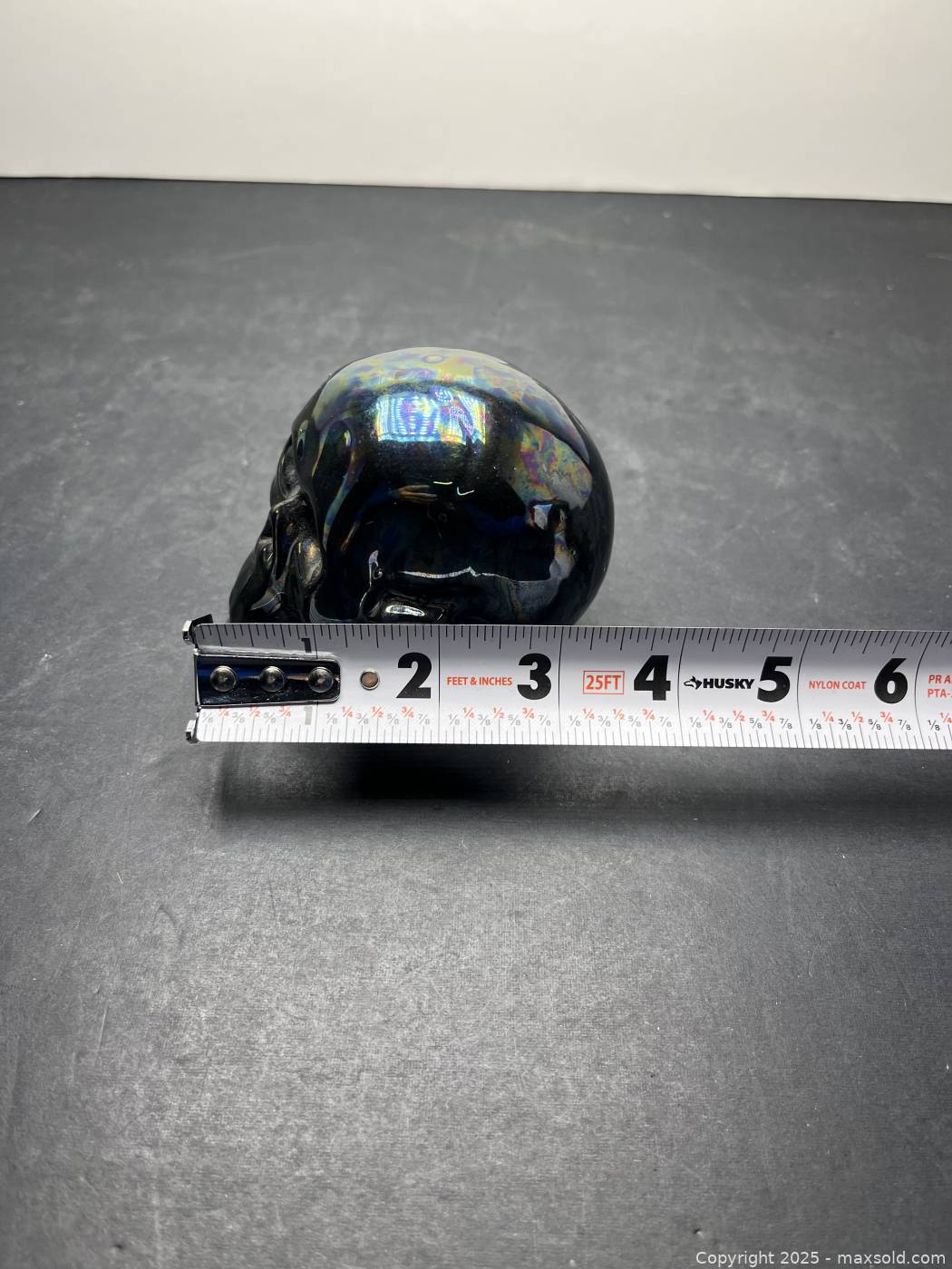 Oil Slick Iridescent Skull Sculptures | Maxsold