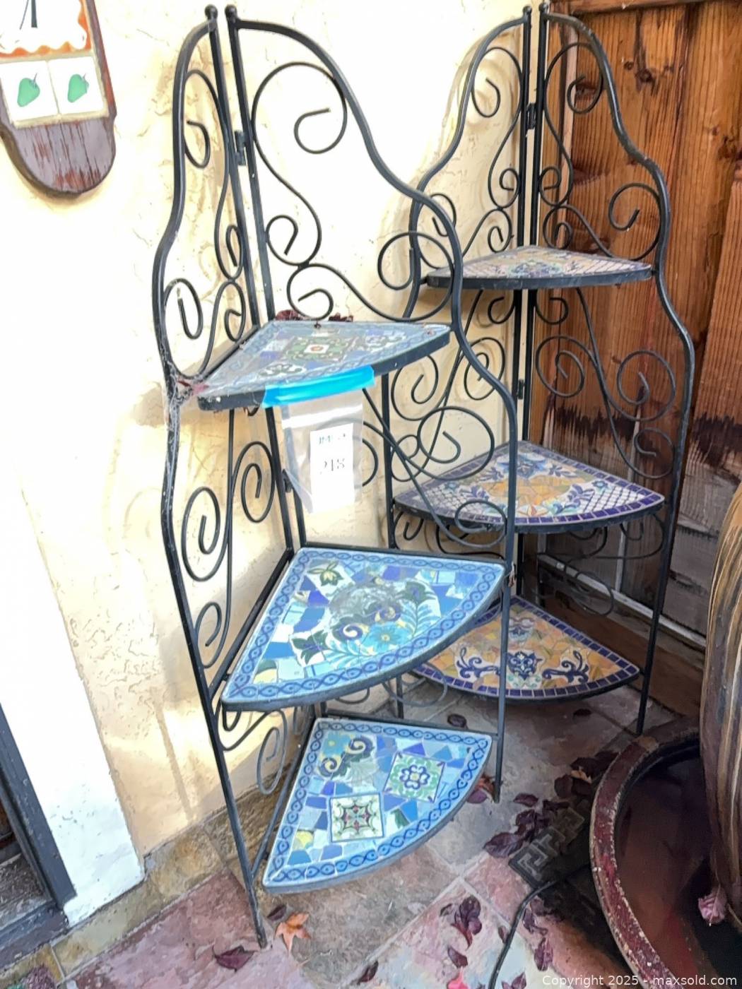 Pair wrought iron corner plant stands | Maxsold