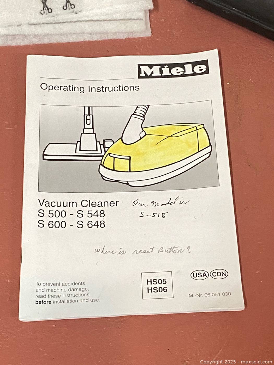Miele Yellow Star canister vacuum with accessories | Maxsold